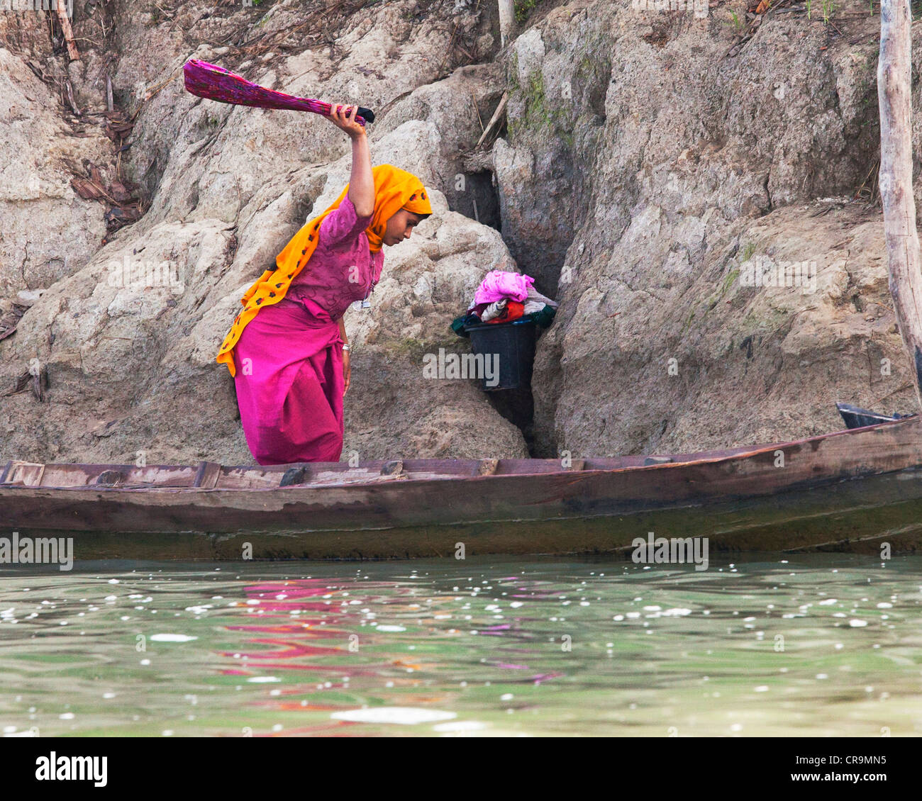 myanamar muslim woman washing clothes Stock Photo - Alamy