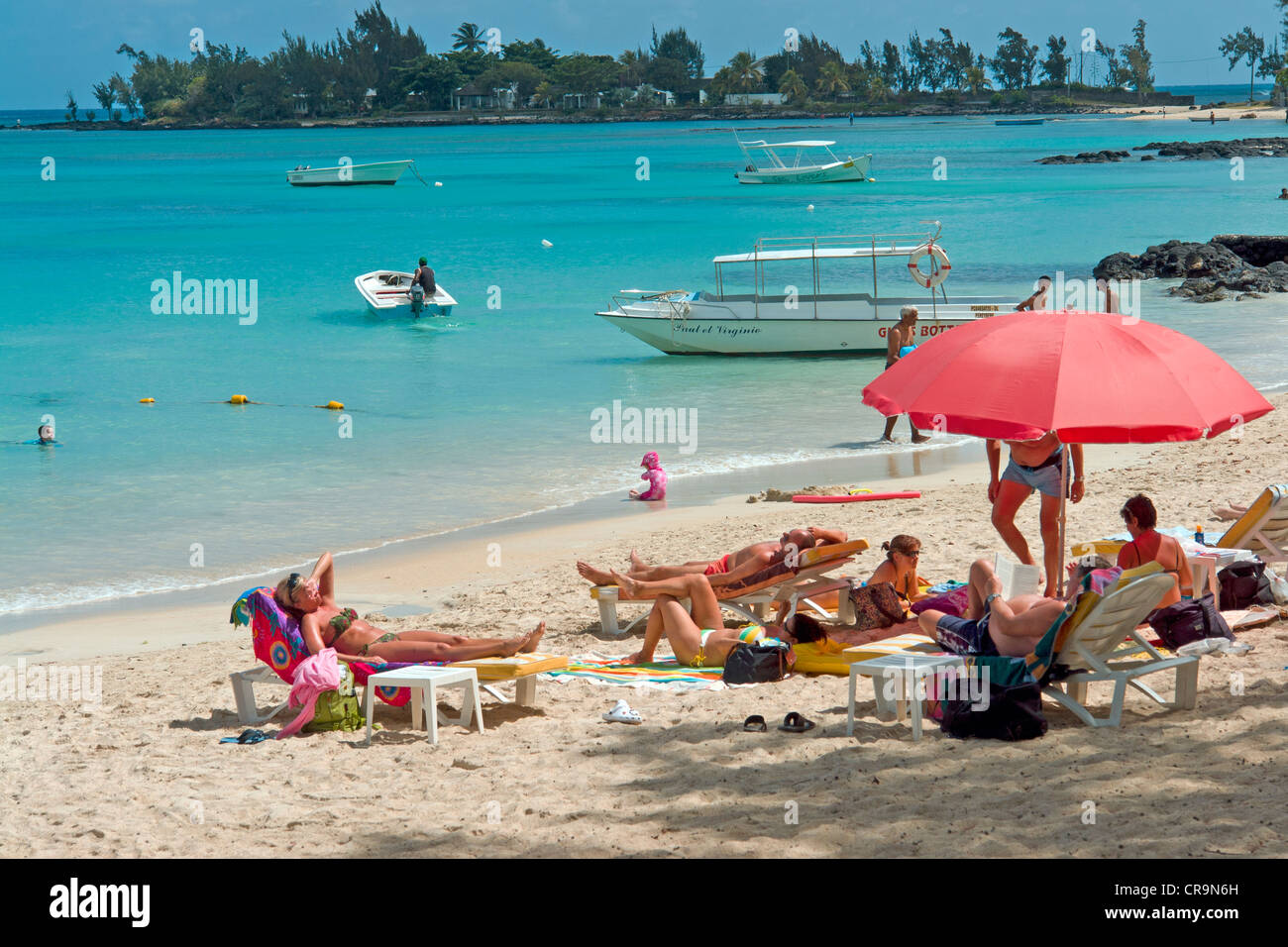 The popular beach of Pereybere on the north coast of the Indian Ocean ...