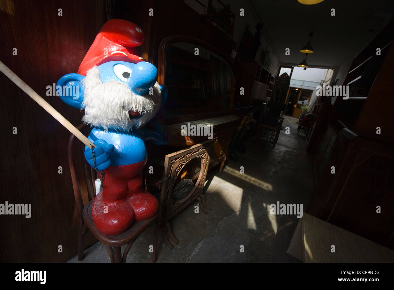 A model of smurf in a garage in France Stock Photo - Alamy