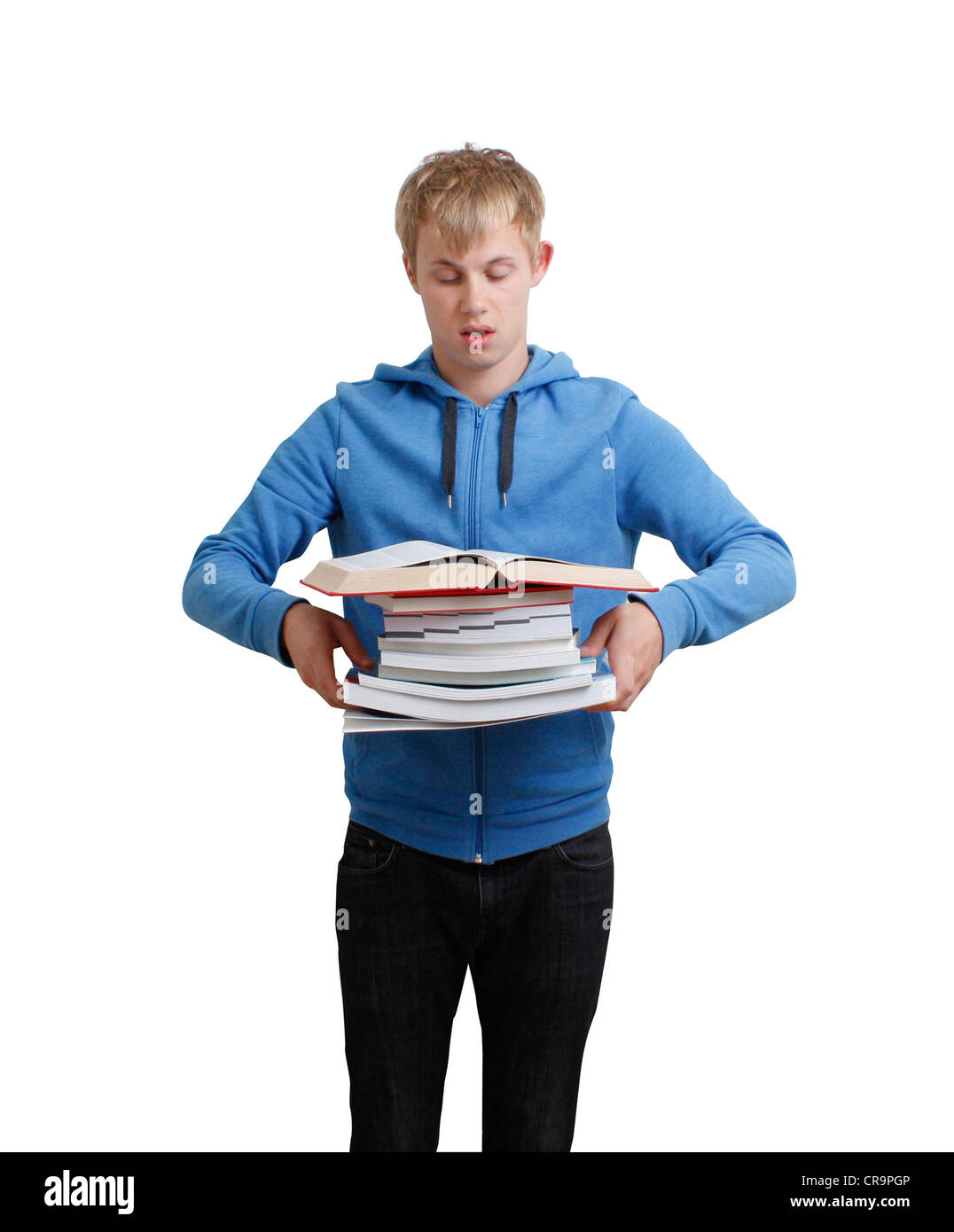 A teenager holding a stack of books Stock Photo - Alamy