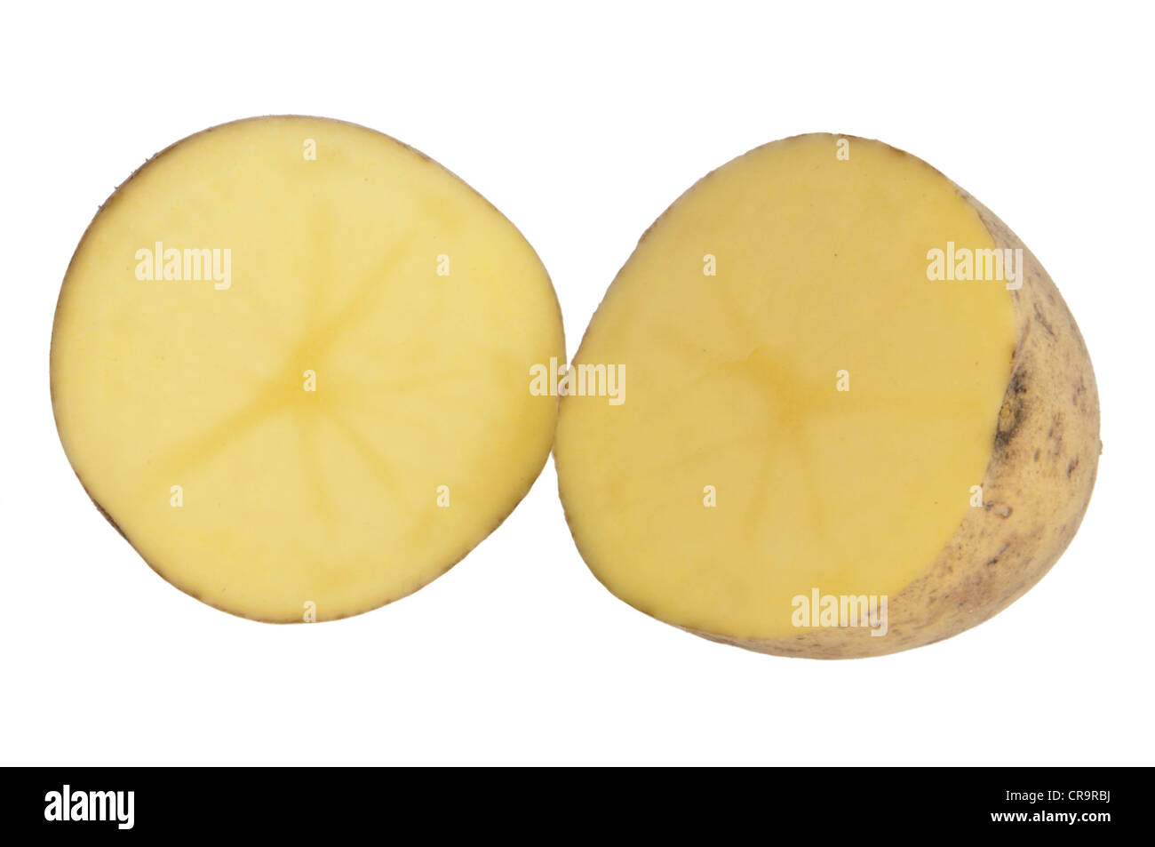 Heap of potatoes isolated on white background Stock Photo - Alamy