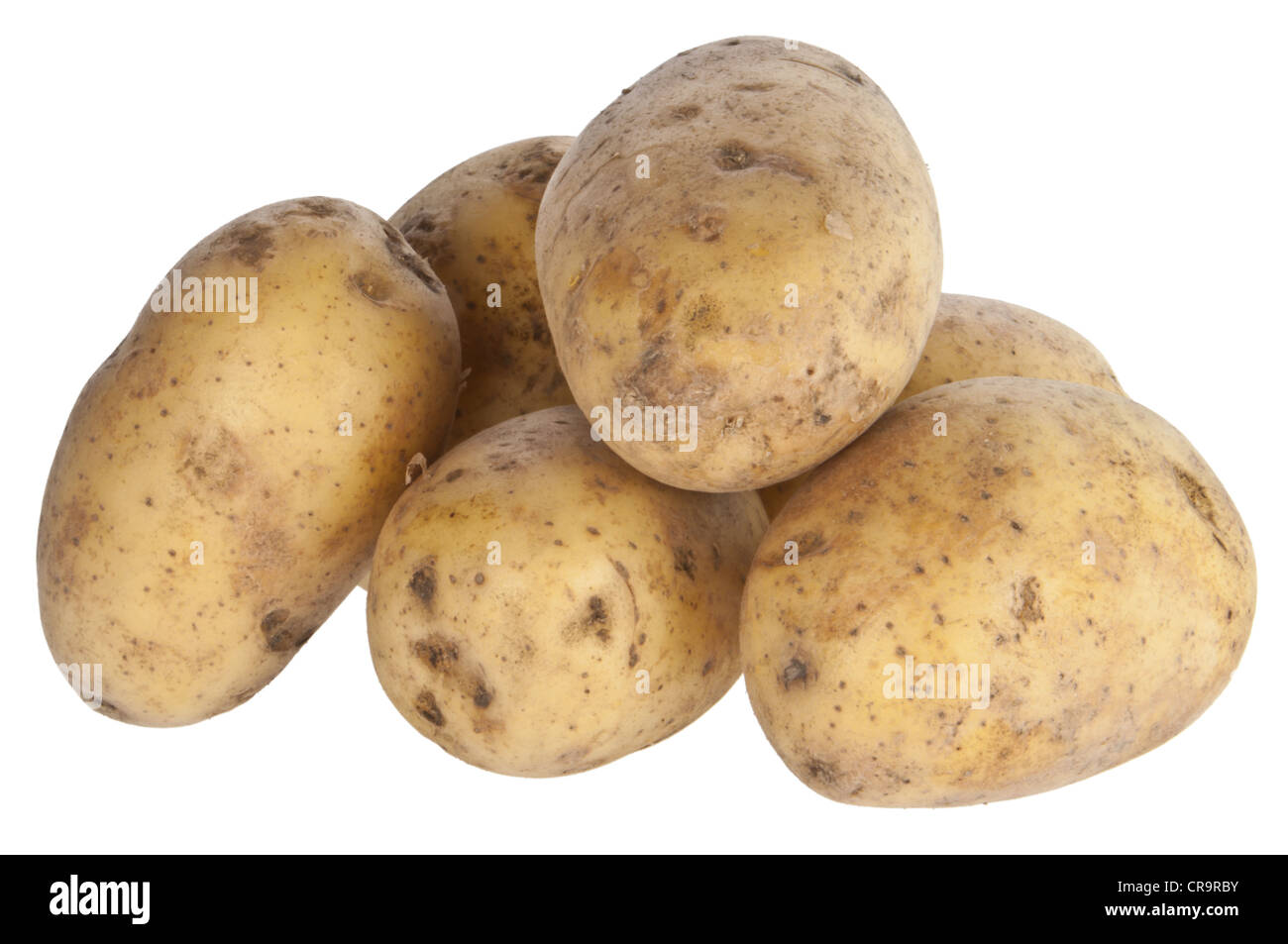 Heap of potatoes isolated on white background Stock Photo - Alamy