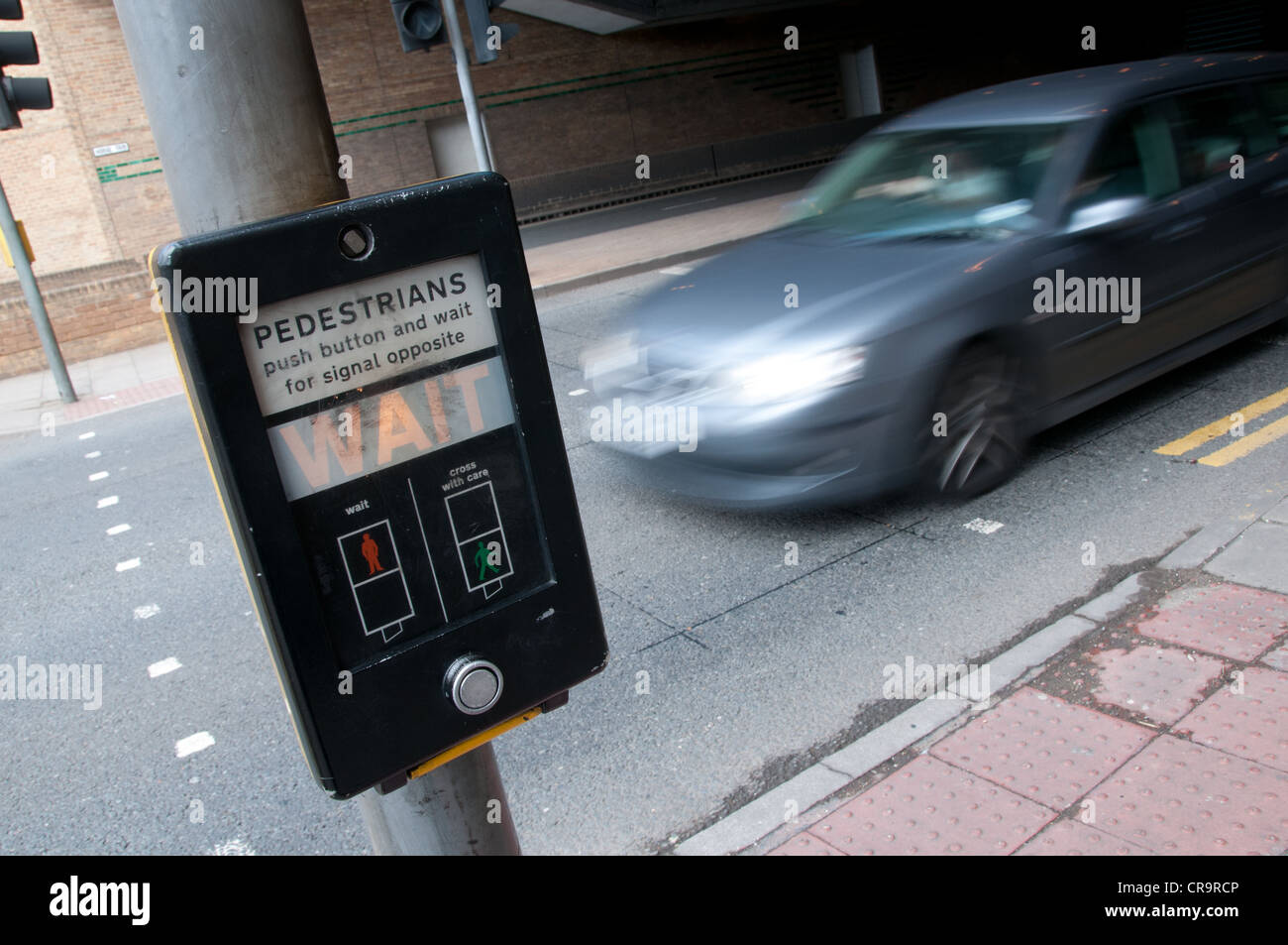 Speeding car at Pedestrian crossing Stock Photo - Alamy