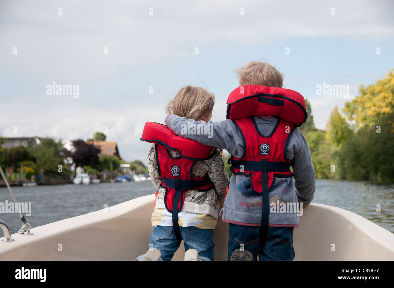 Boy and Girl Sailing Stock Photo - Alamy