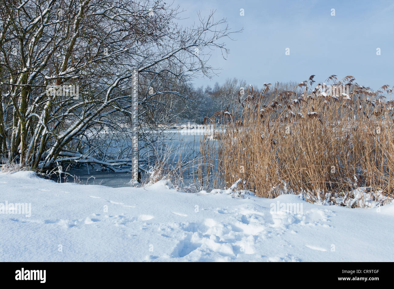 Depth meter on frozen lake Stock Photo - Alamy