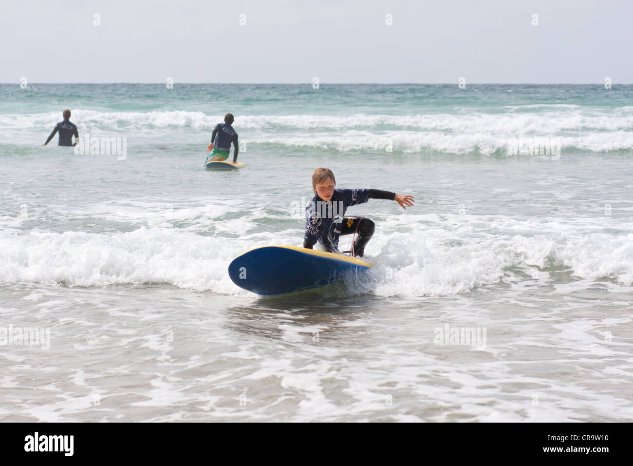 Boy learning to surf hi-res stock photography and images - Alamy