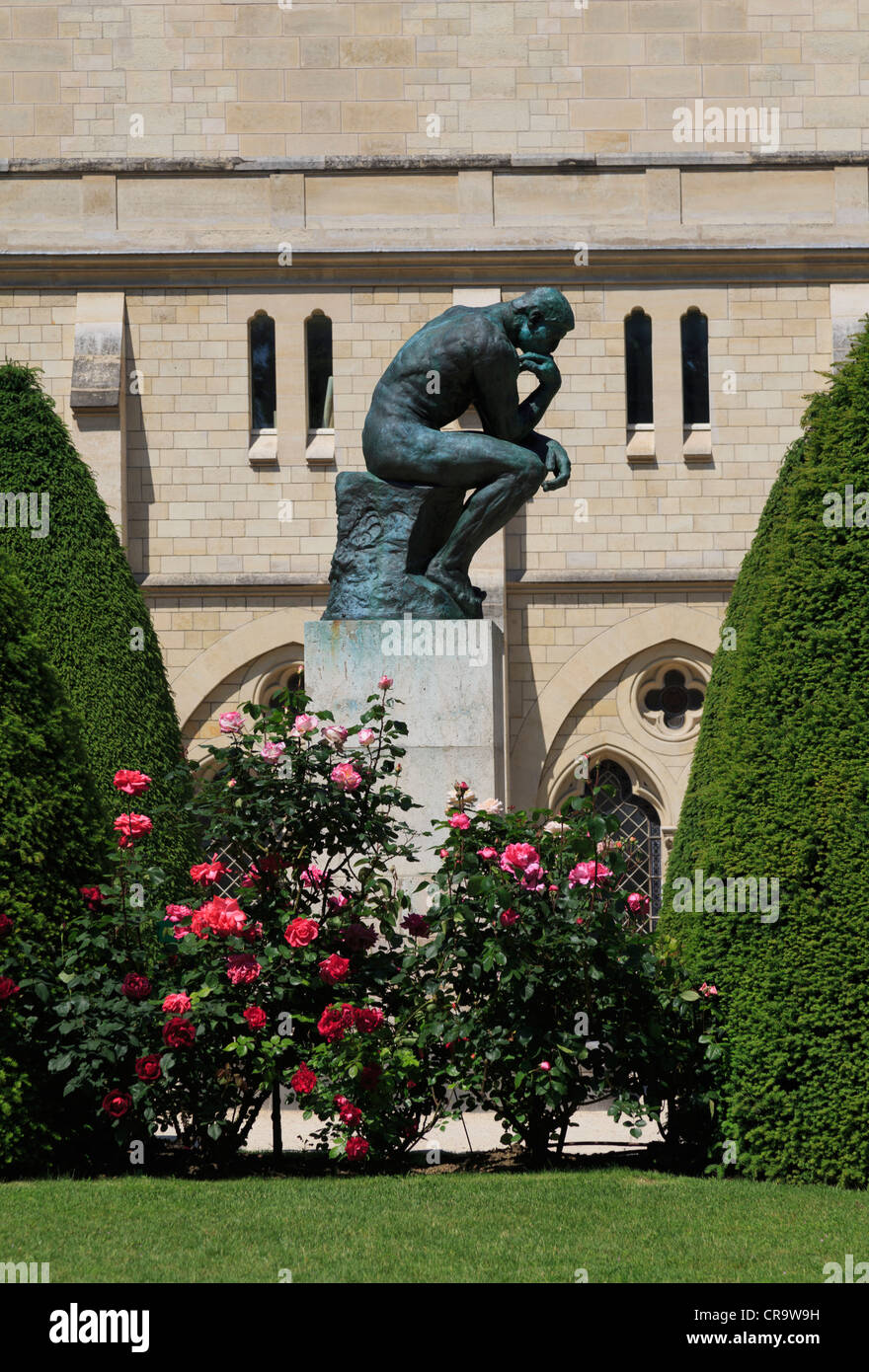 Bronze sculpture The Thinker by Auguste Rodin. Famous statue in the gardens of the Musee Rodin ...