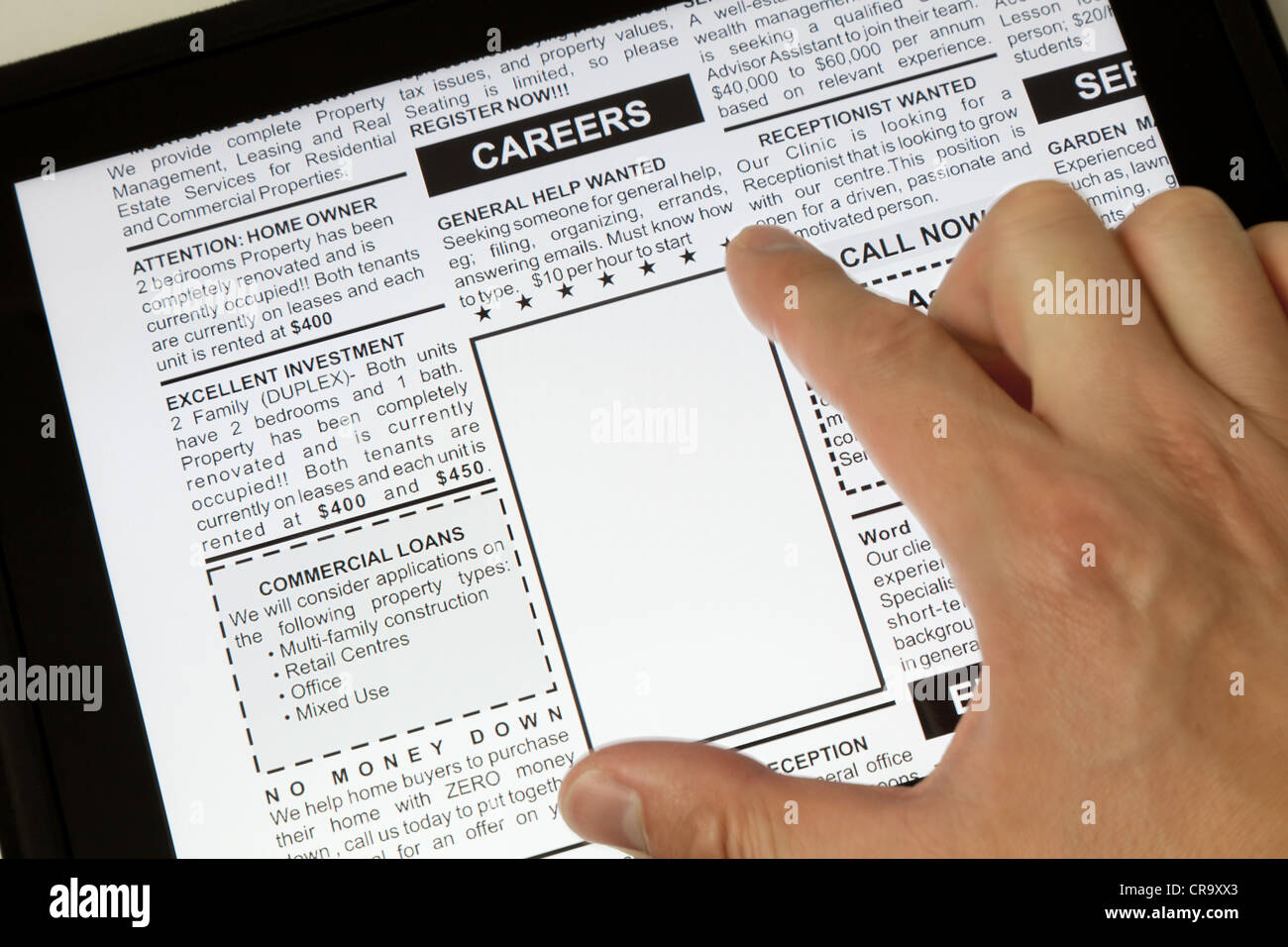 Fake Classified Ad, newspaper and Touch Screen, business concept Stock ...
