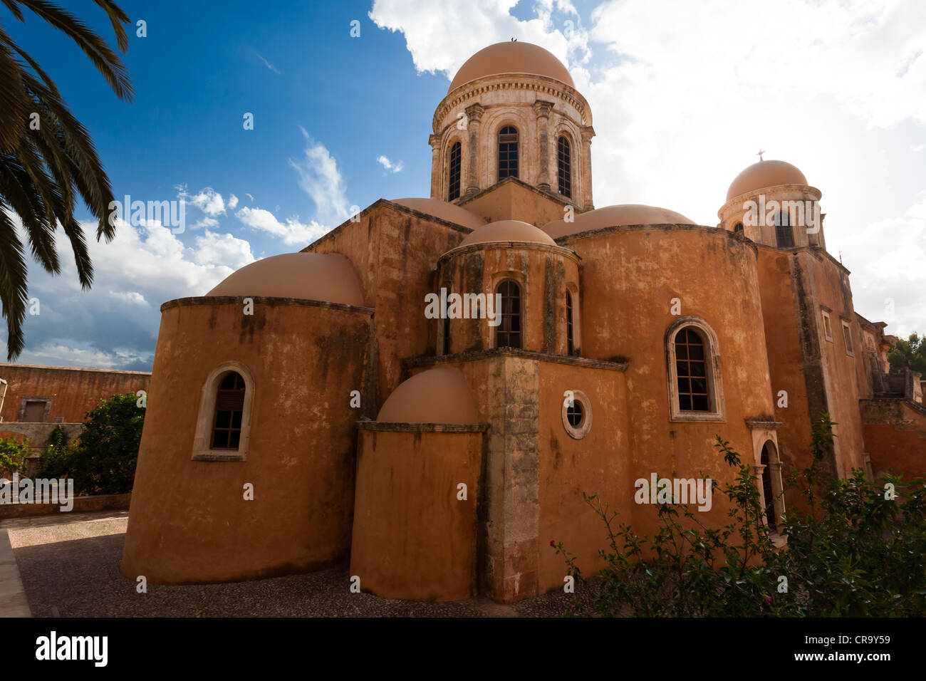Clustered curved shapes of red-painted walls of the Agia Triada ...