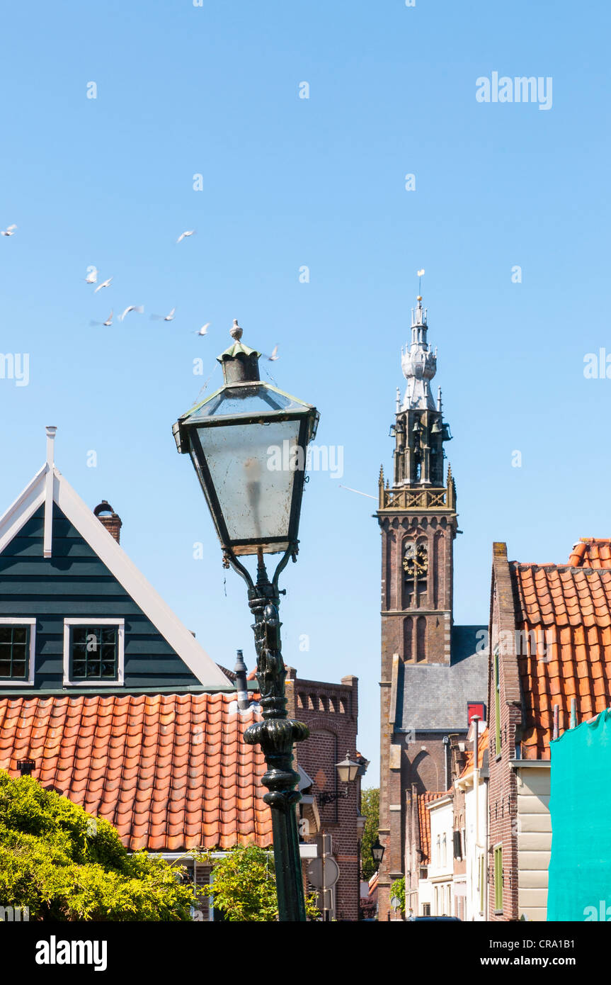 Detail of lamp post in Edam, Holland, with spire of Speeltoren in the ...