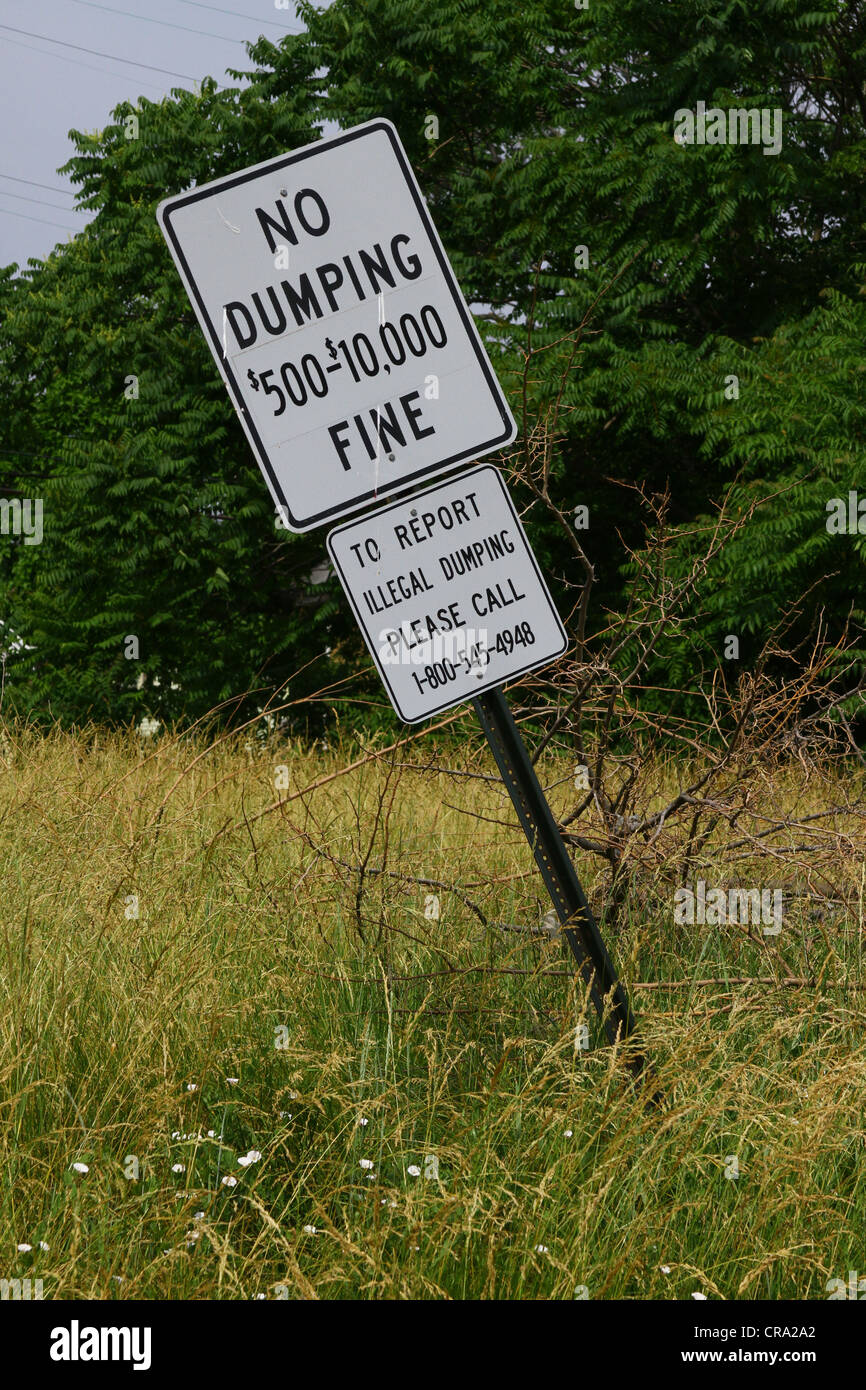 A sign posted to discourage illegal dumping in Detroit's west side ...