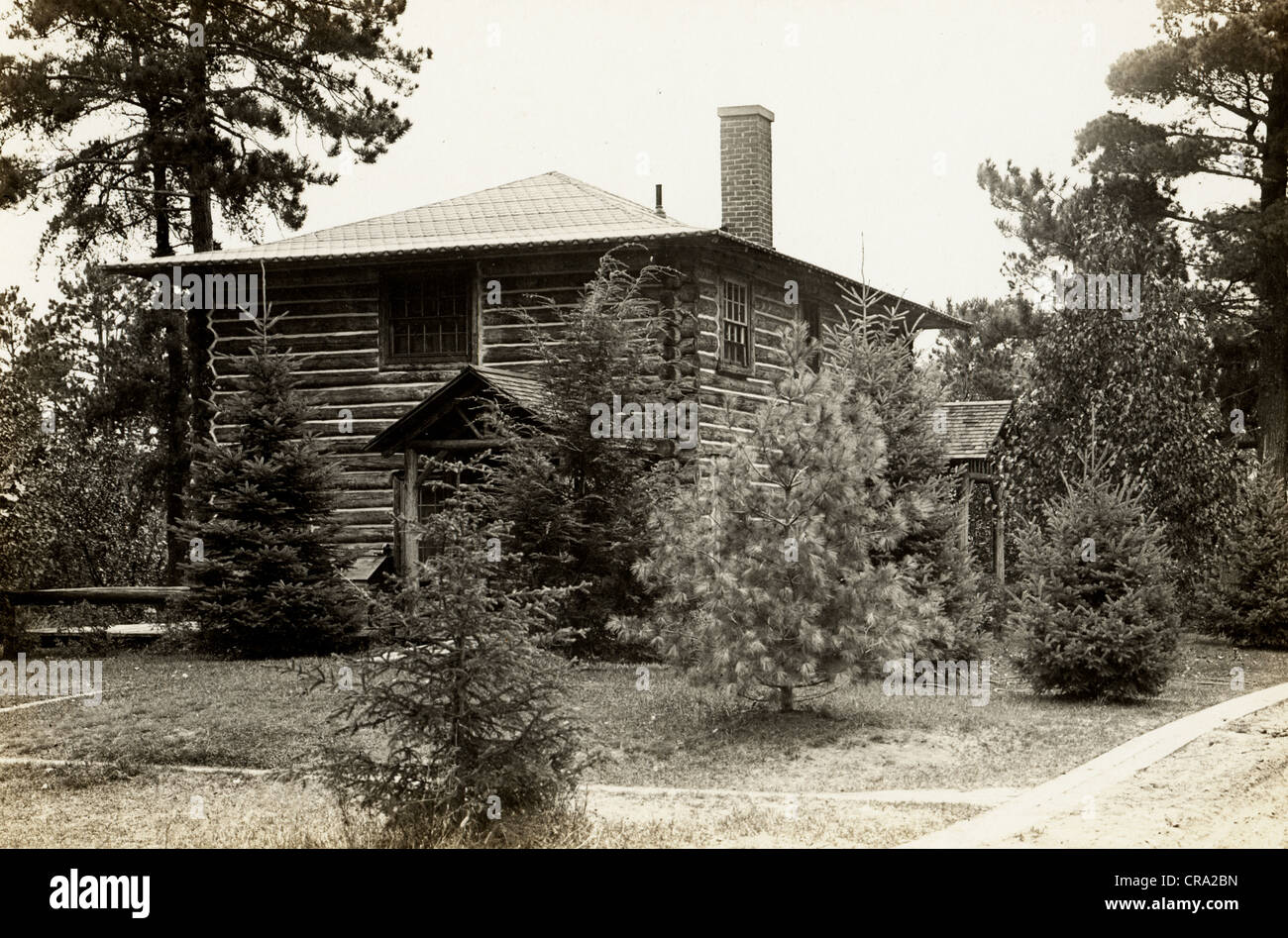 Unusual Foursquare Style Log Cabin Stock Photo - Alamy
