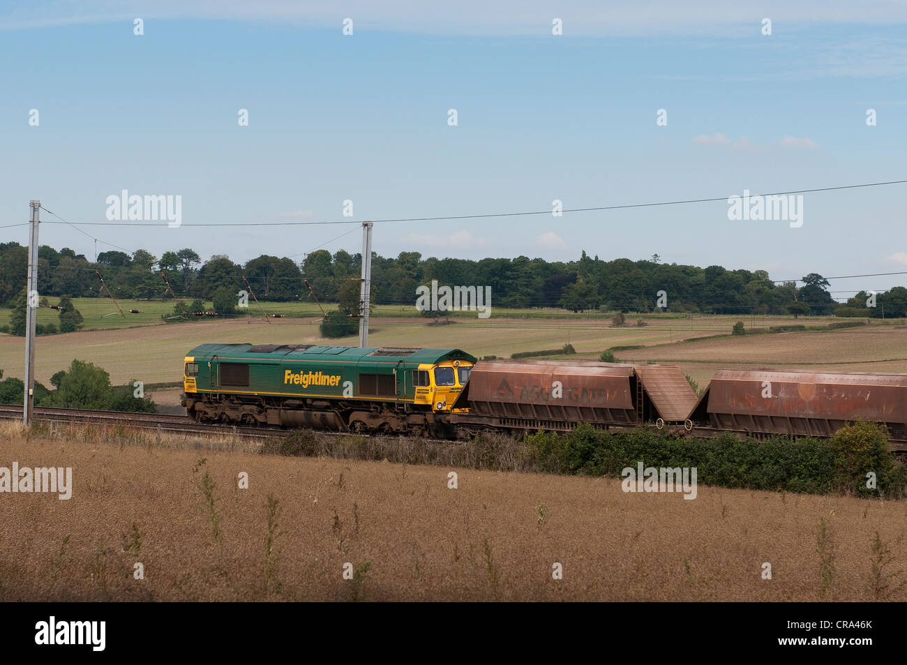Freightliner locomotive hauling aggregate wagons through the English ...