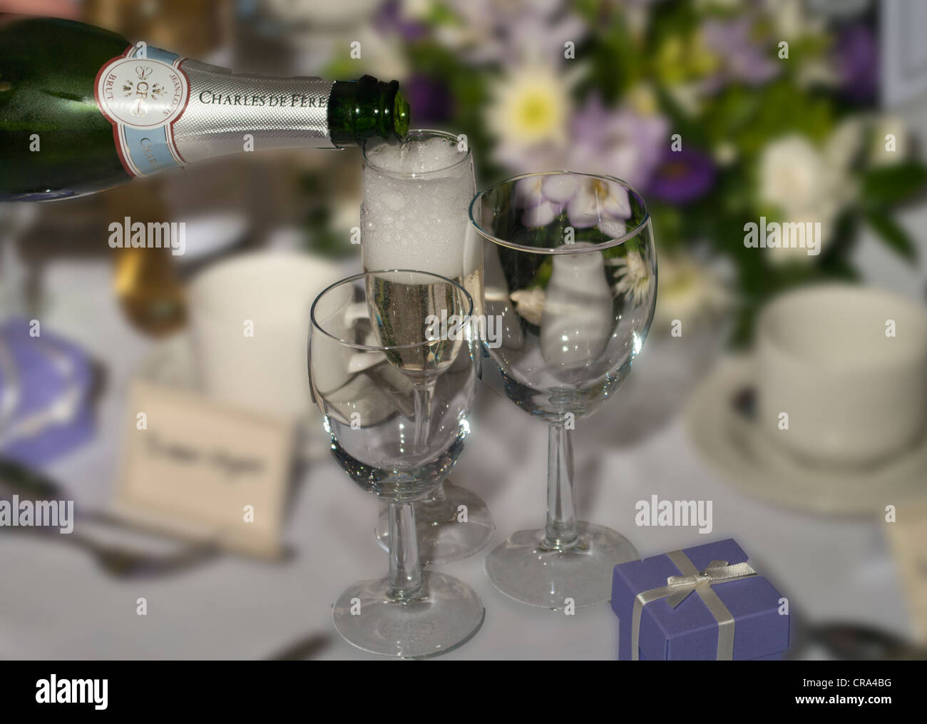 Pouring the toast Stock Photo - Alamy