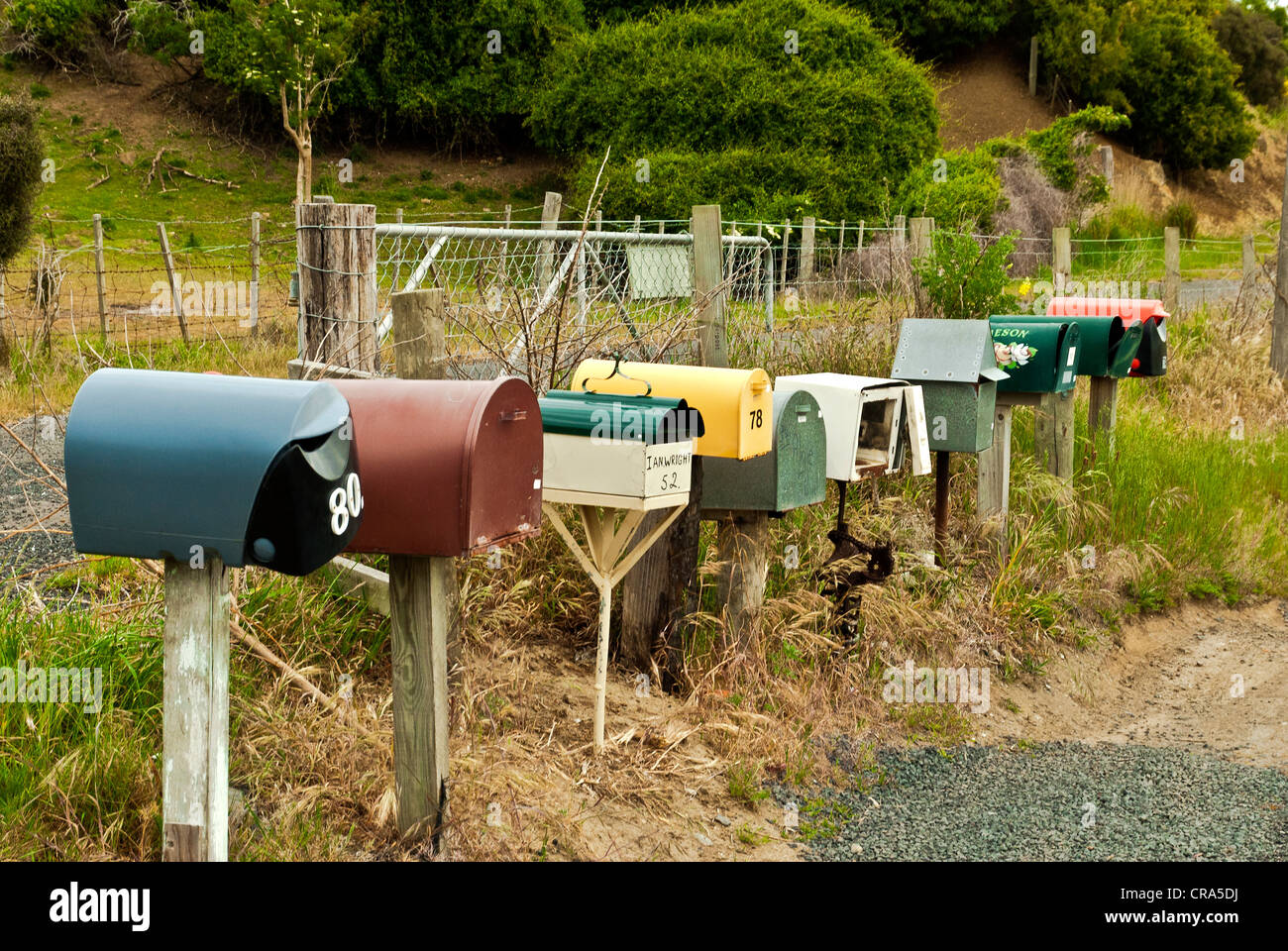 Row colored post boxes road side hi-res stock photography and images ...