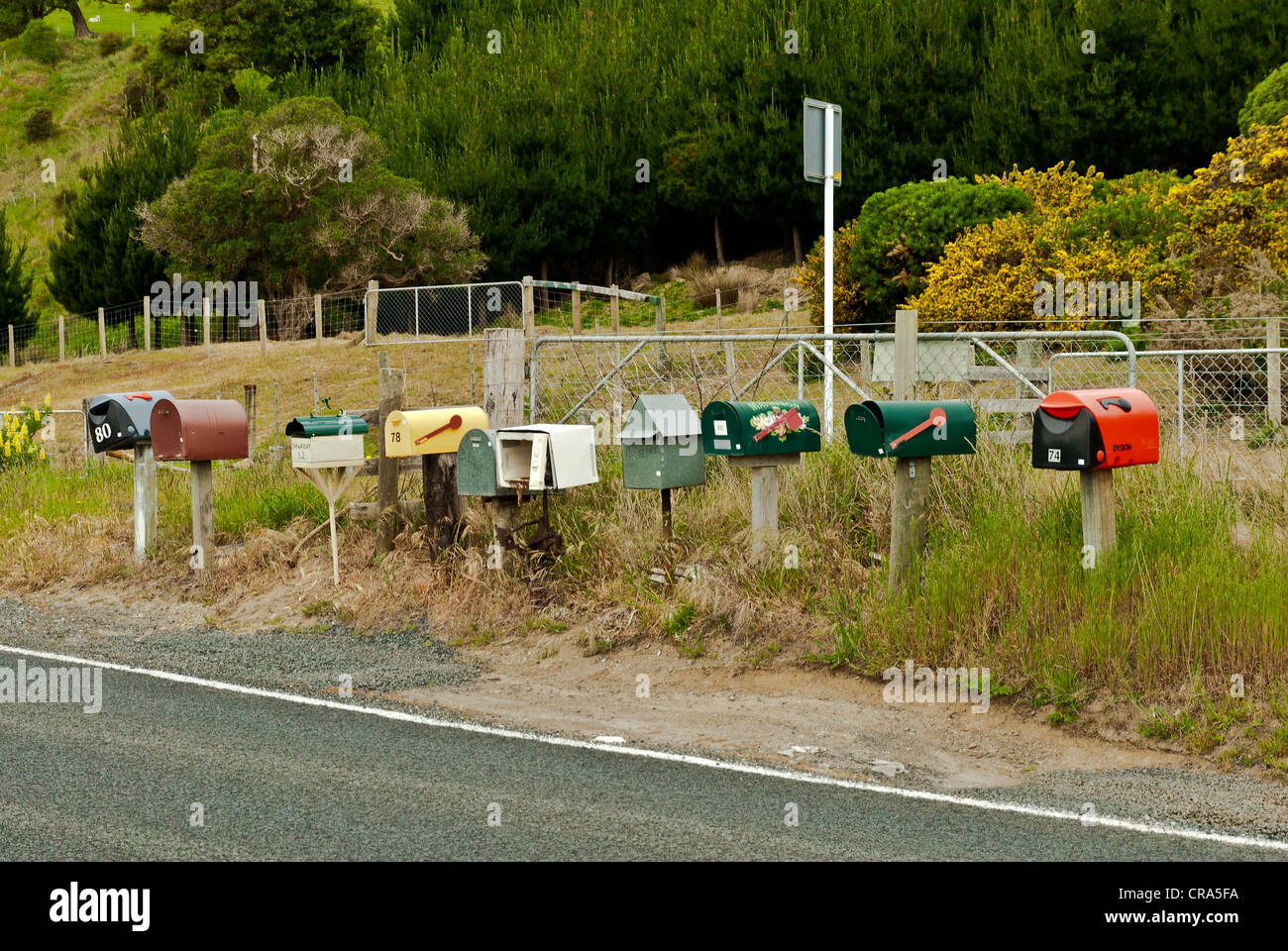 Row colored post boxes road side hi-res stock photography and images ...