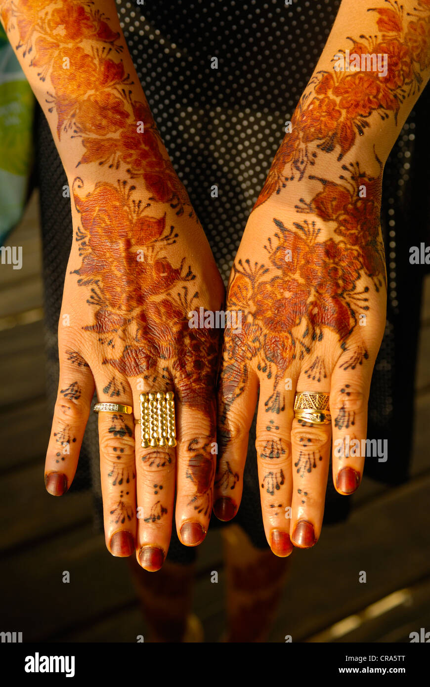 Hands painted with henna after a wedding ceremony, Grand Comore ...