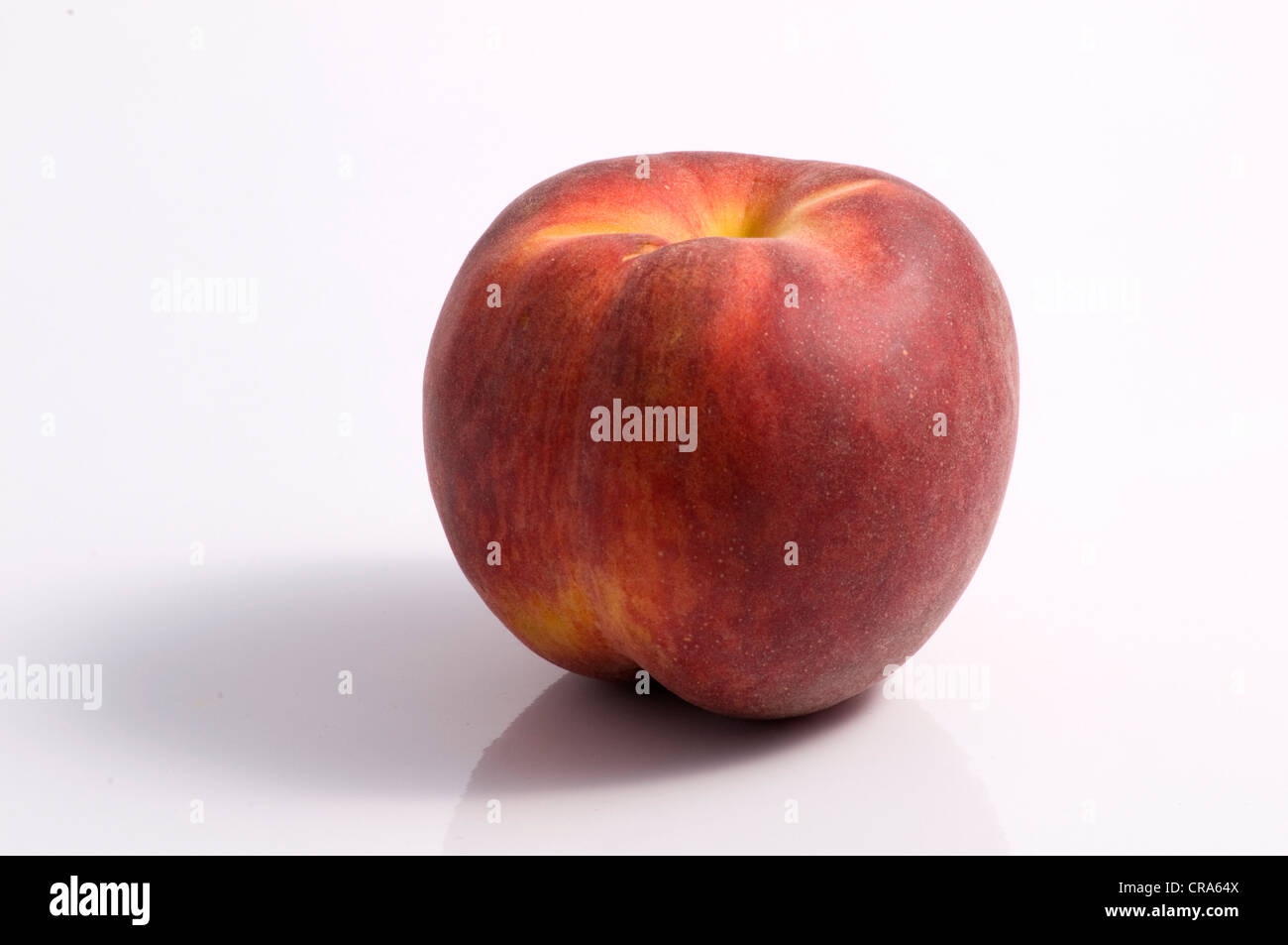 One peach fruit on white background Stock Photo - Alamy