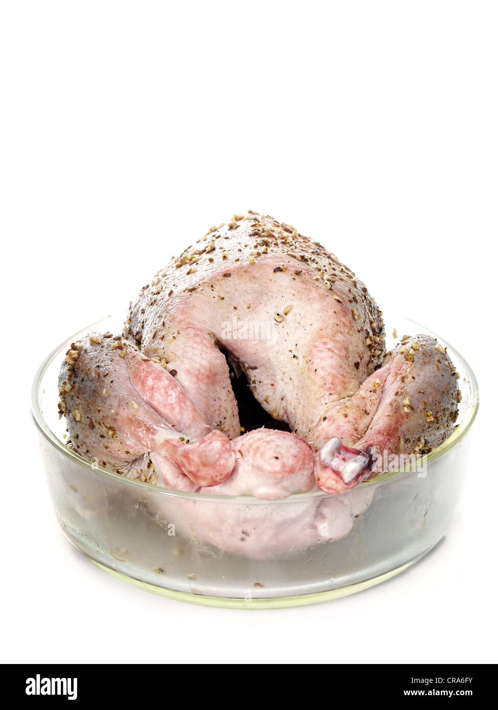 Traditional Polish goose on glass baking plate prepared and ready for ...