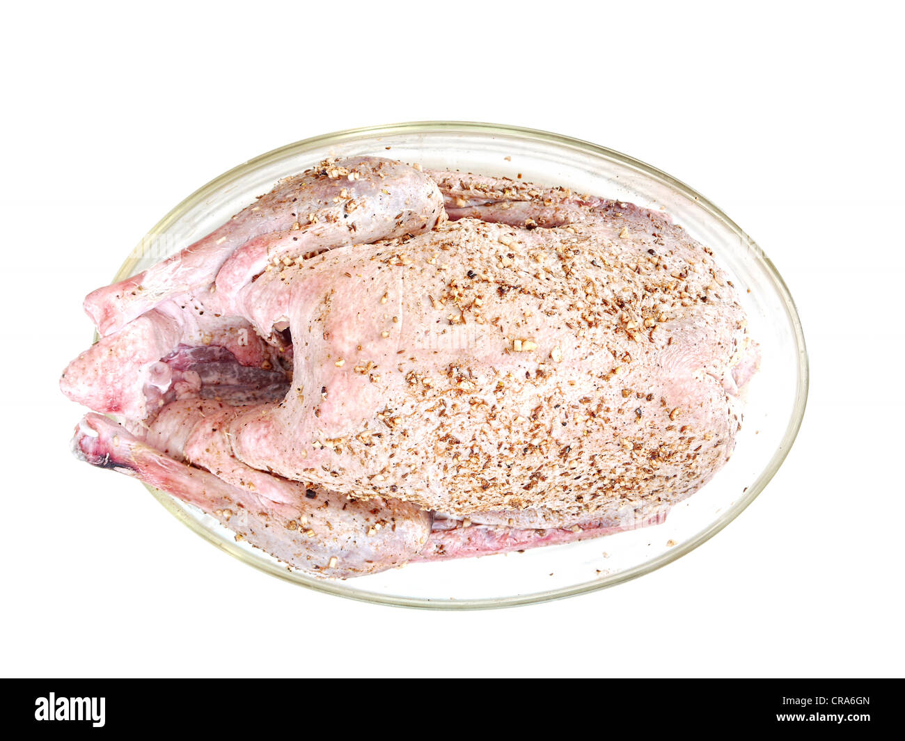 Traditional Polish goose on glass baking plate prepared and ready for ...