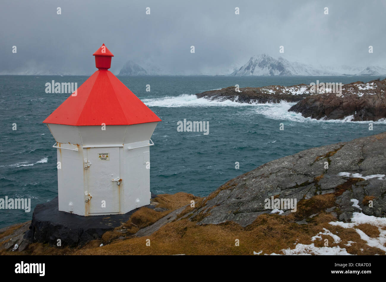 Lighthouse on the rocky coast of Henningsvaer, Austvagoy island ...
