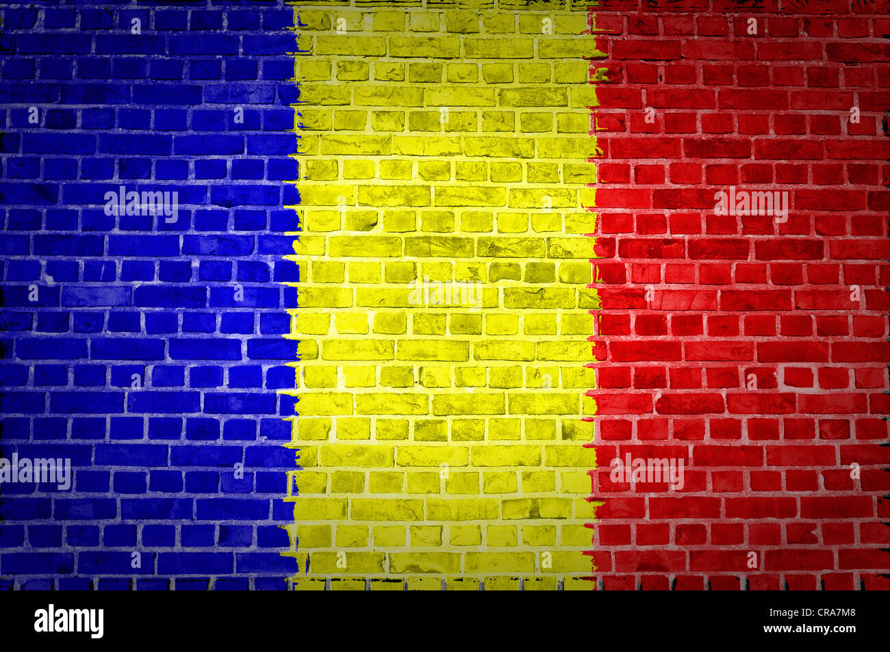 An image of the Chad flag painted on a brick wall in an urban location ...