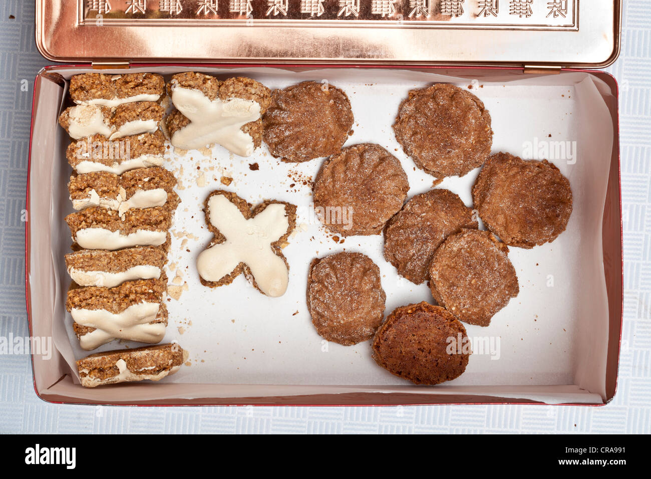 Cinnamon cross biscuits and bear paw biscuits Stock Photo - Alamy