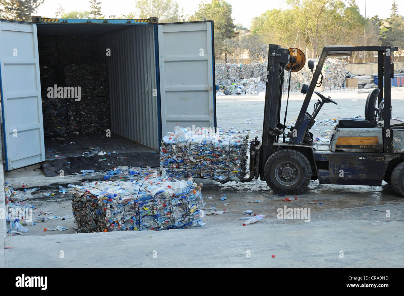 A waste separation site where different recyclable materials are ...