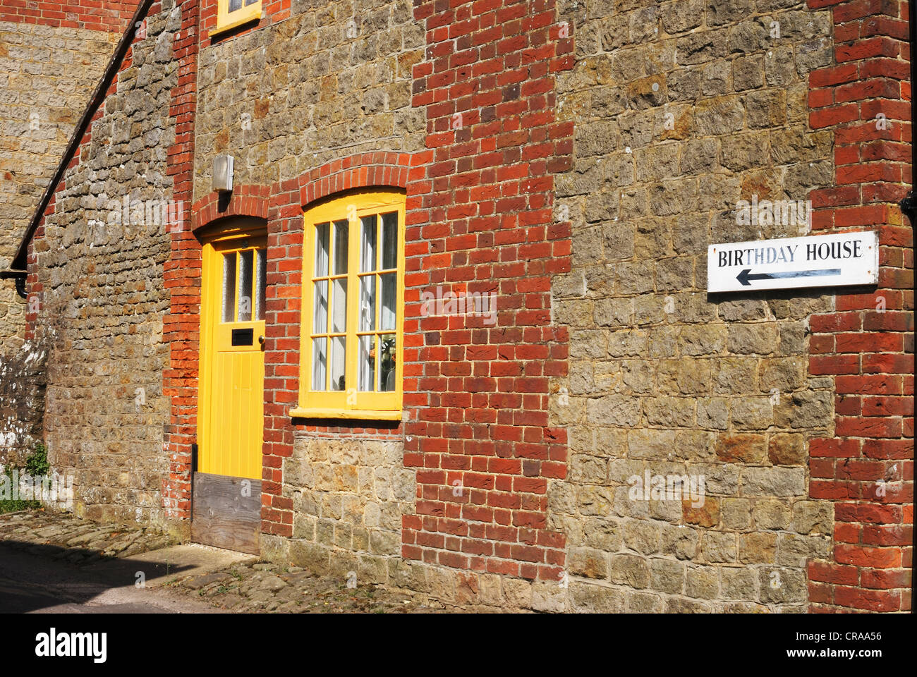 Brick and stone cottages at Easebourne near to Midhurst. West Sussex ...