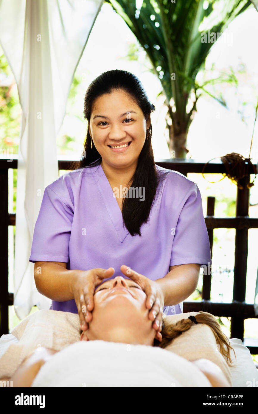 Woman having facial in spa Stock Photo - Alamy