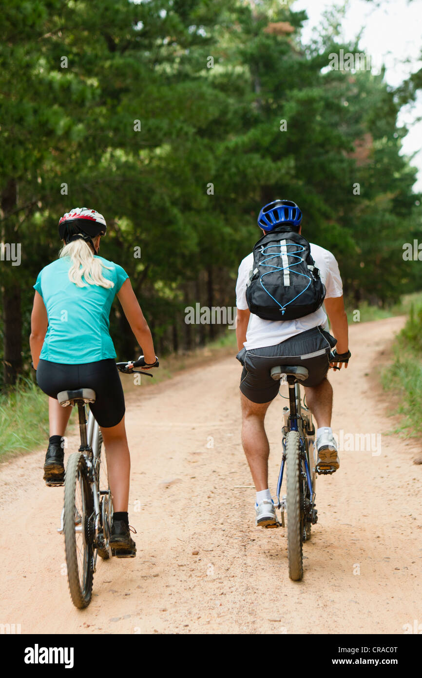 Young day sitting biking cycling rear hi-res stock photography and ...