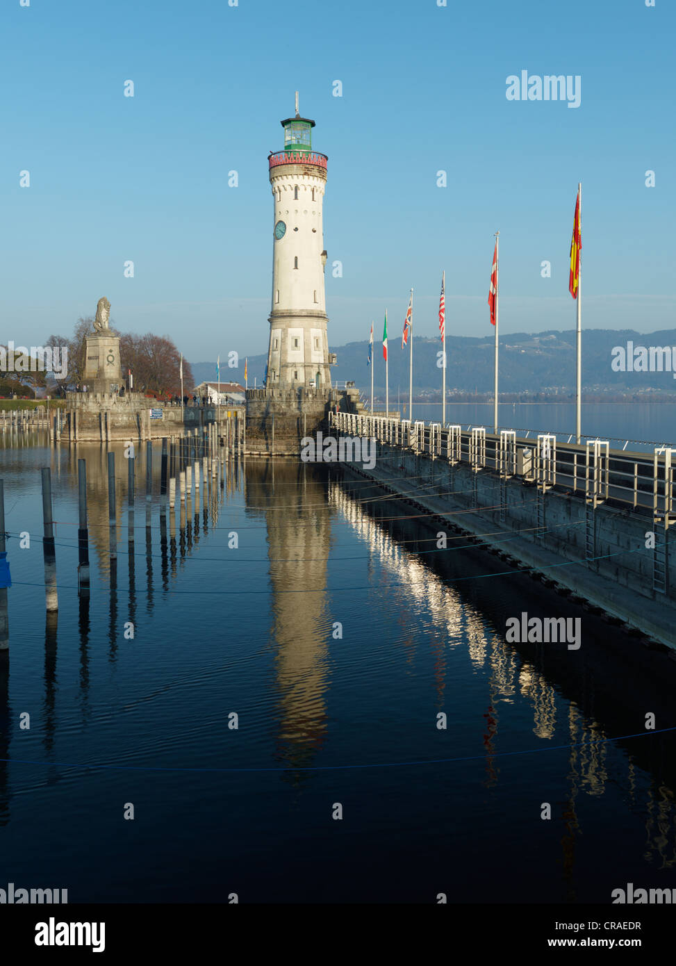 Harbour entrance of Lindau harbour with the Bavarian lion statue and ...