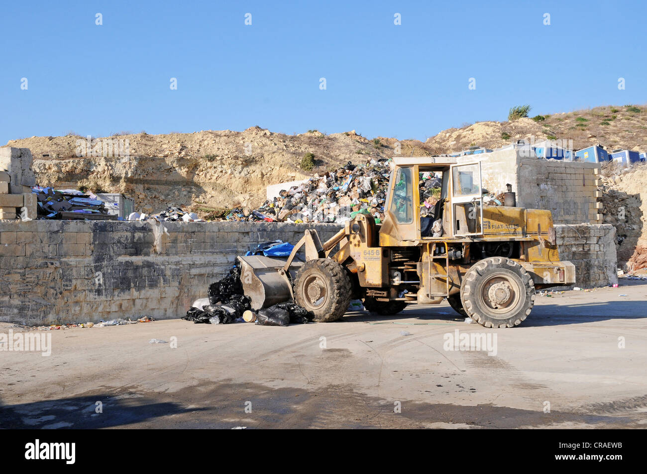 A waste separation site where different recyclable materials are ...