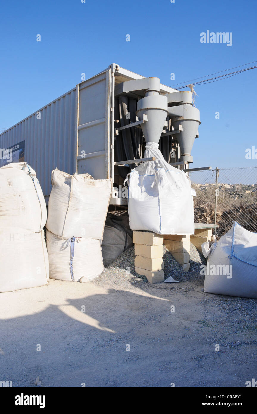 A waste separation site where different recyclable materials are ...