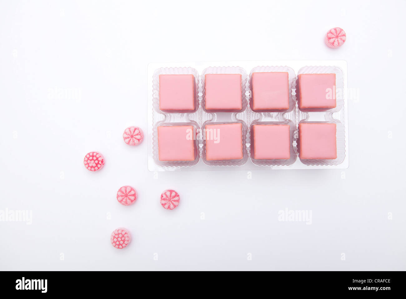 Pink chocolates and candies Stock Photo - Alamy