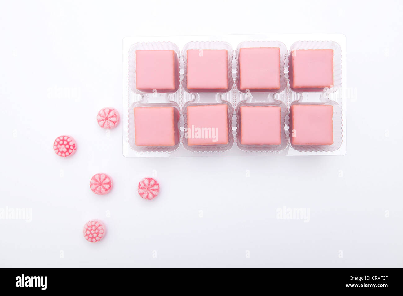 Pink chocolates and candies Stock Photo - Alamy