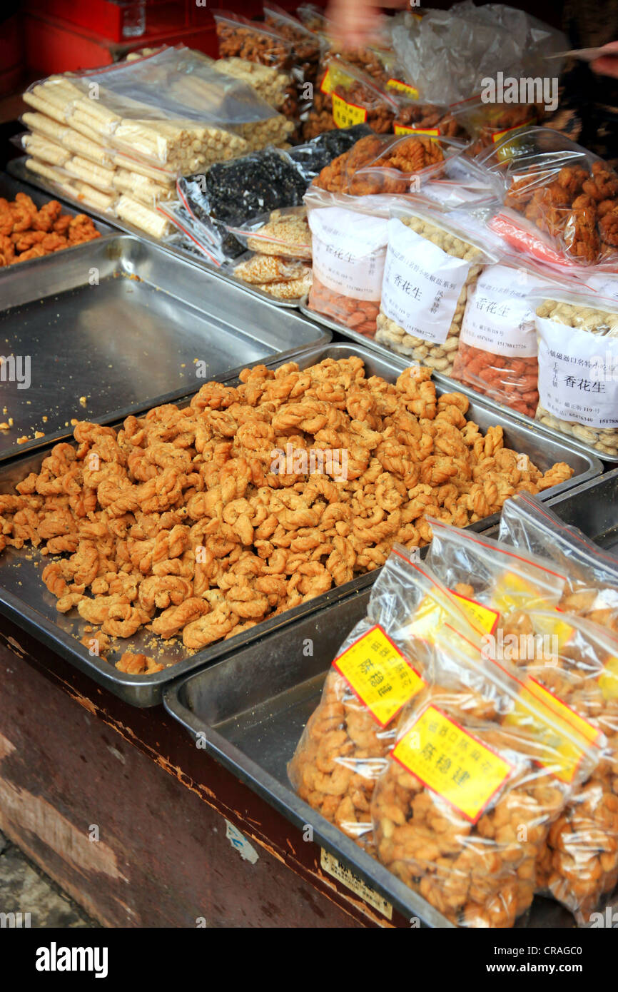 A shop selling traditional sweets in a street of Chongqing Stock Photo ...