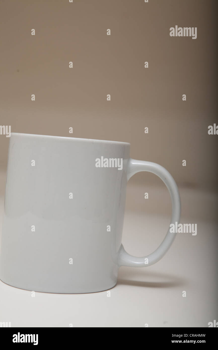 A white cup of coffee Stock Photo - Alamy