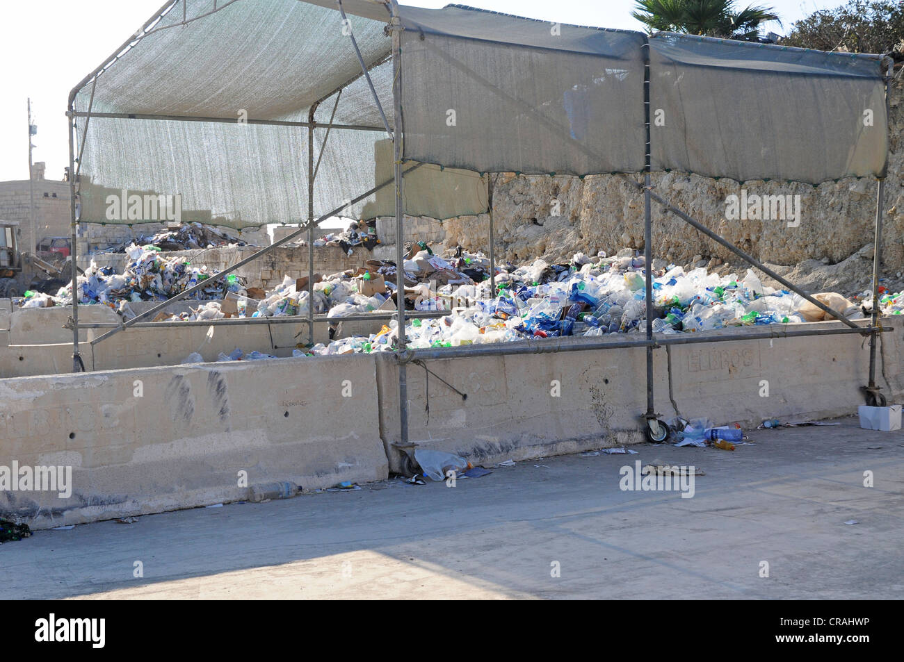 A waste separation site where different recyclable materials are ...