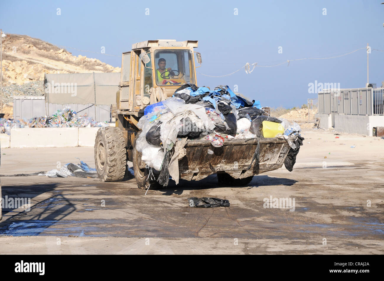 A waste separation site where different recyclable materials are ...