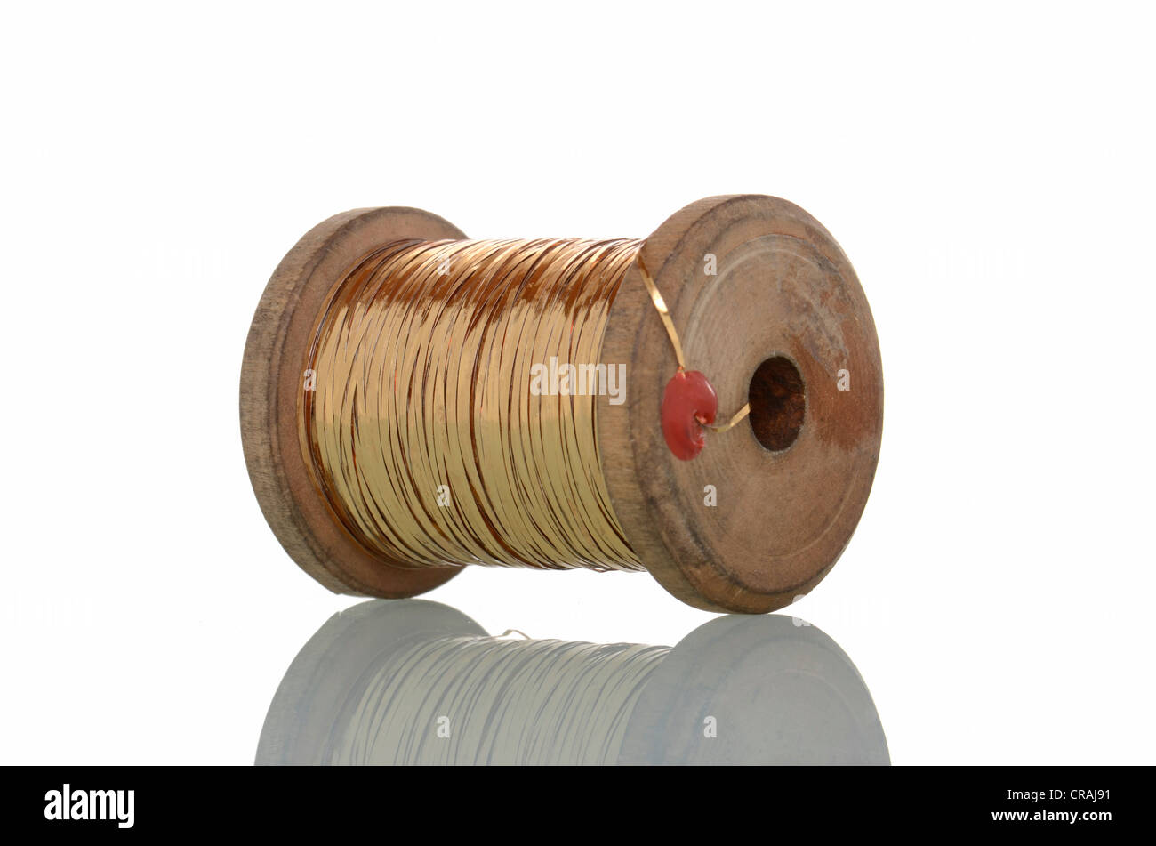 Golden yarn hi-res stock photography and images - Alamy