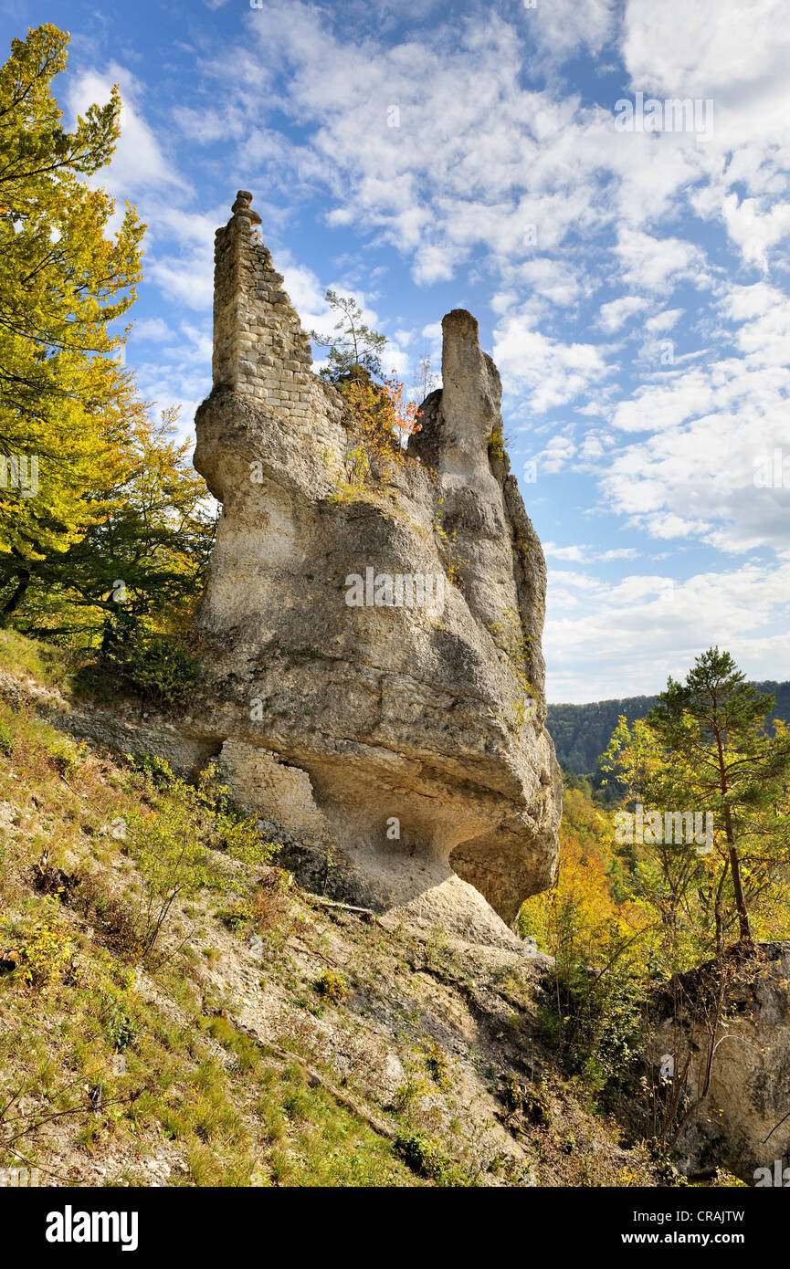 Washed out Jurassic limestone pinnacle in the autumnal Danube Valley ...