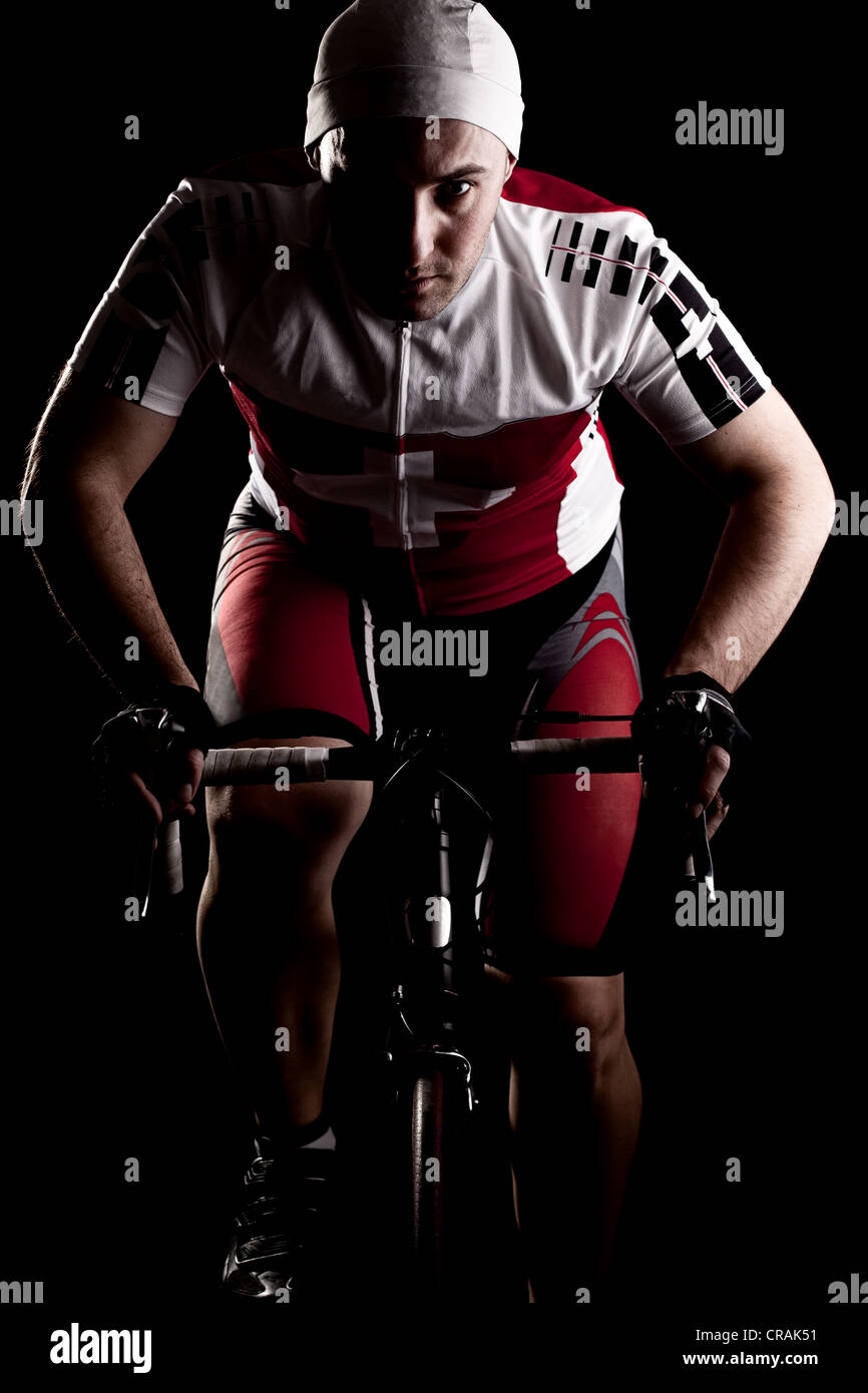 fully equipped cyclist riding a bicycle Stock Photo - Alamy