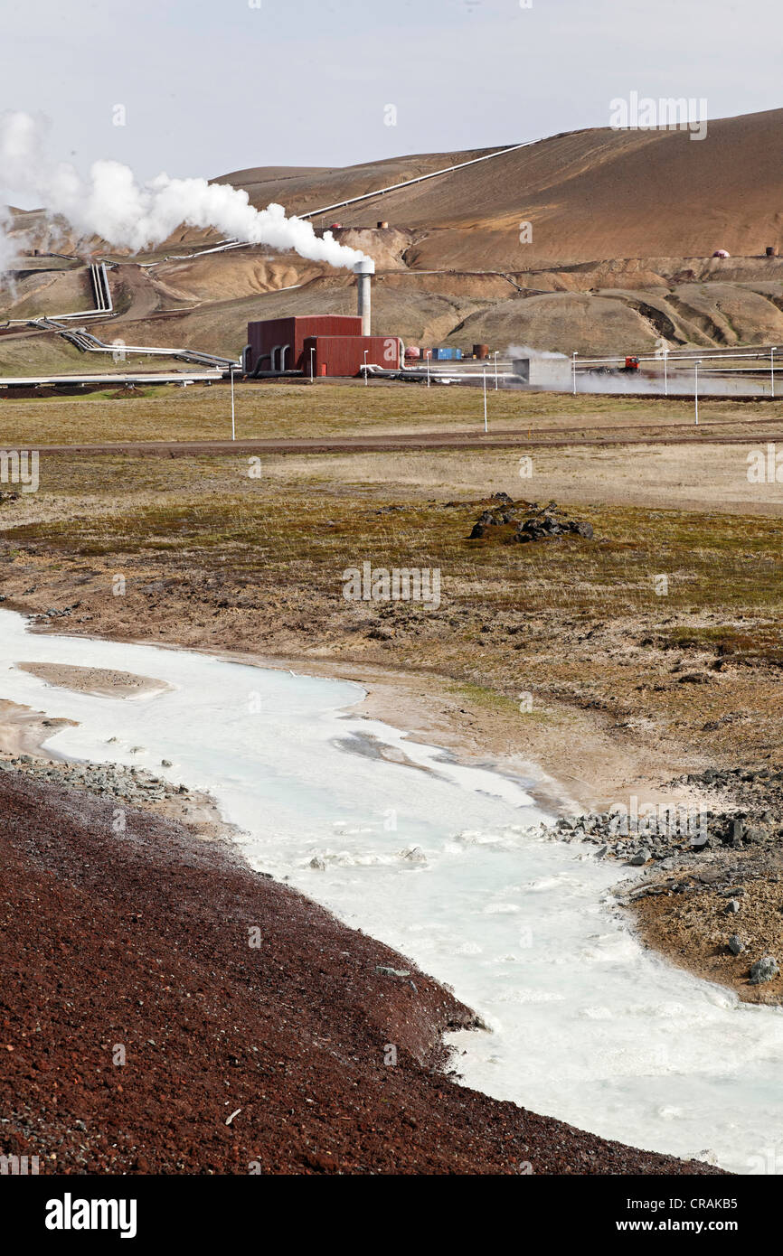 Hot water flowing from the distribution station of the Kroefluvirkjun ...