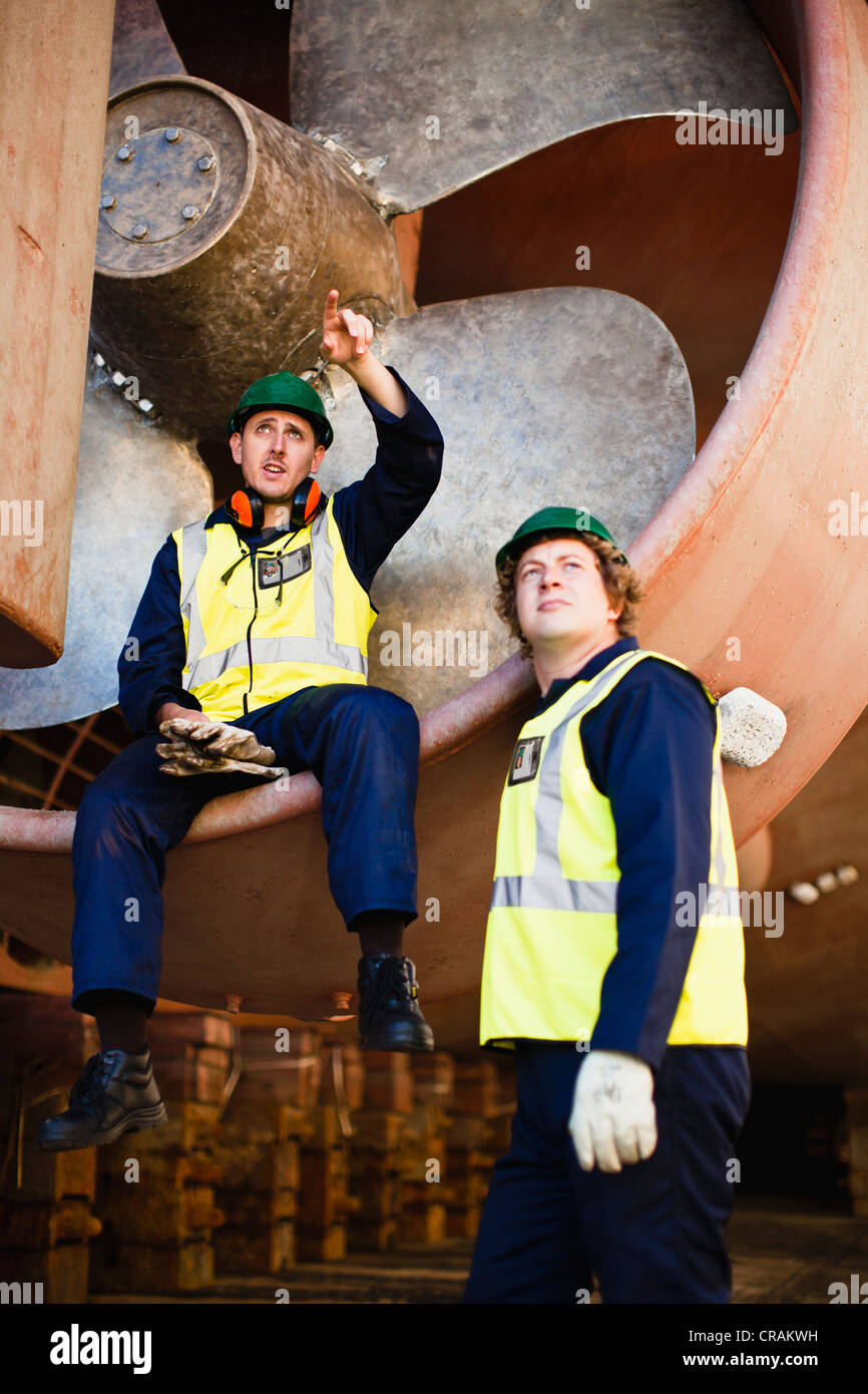 Man working on boat in dry dock hi-res stock photography and images - Alamy
