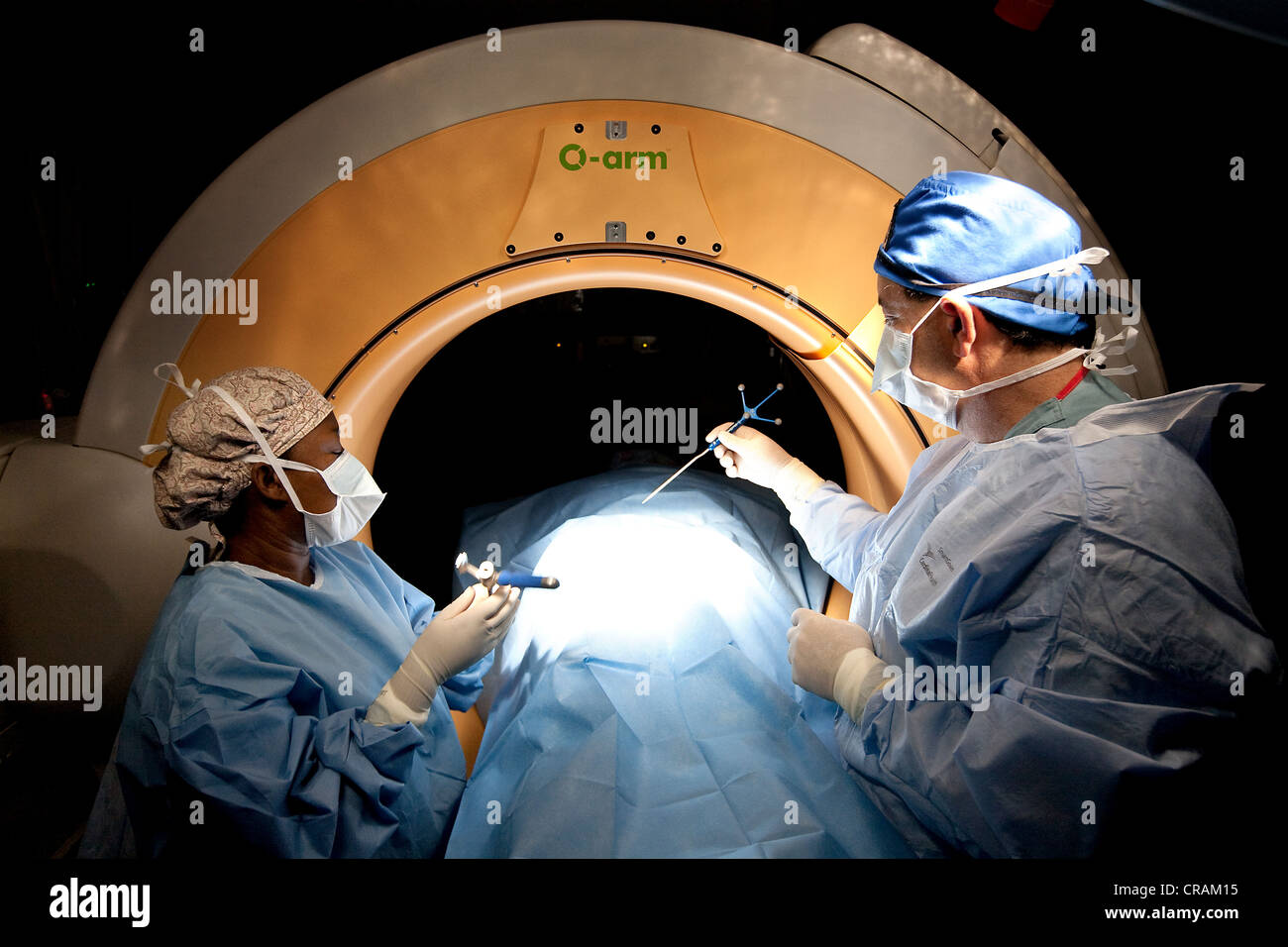 A doctor and nurse prepare for O-Arm surgery Stock Photo - Alamy