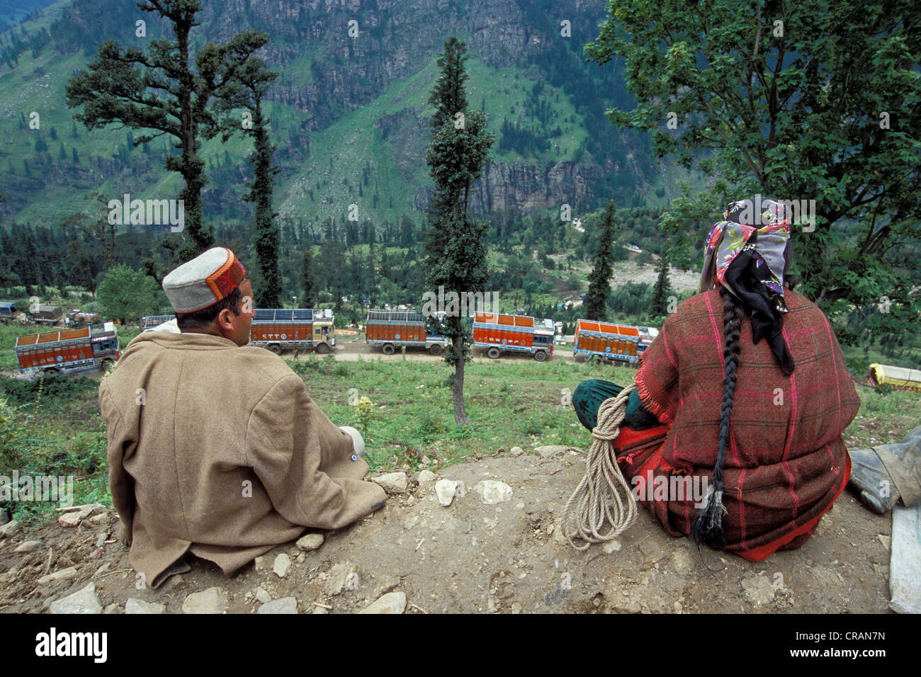 Himalayan people wearing traditional clothes, waiting, watching a ...