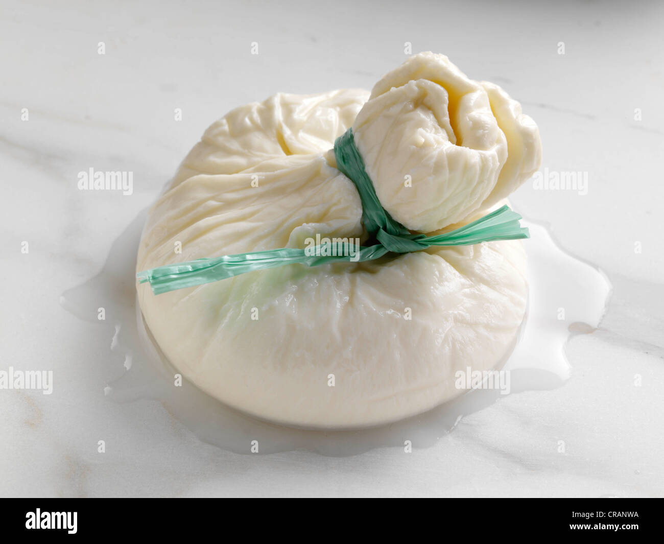 A whole Burrata Italian soft cheese Stock Photo - Alamy