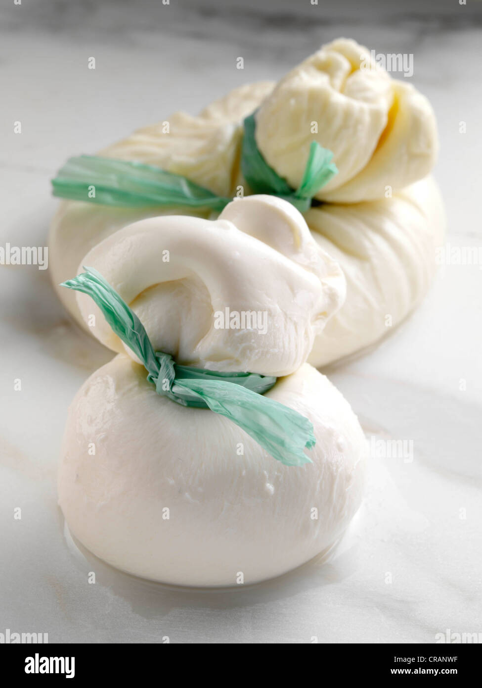 A whole Burrata Italian soft cheese Stock Photo - Alamy