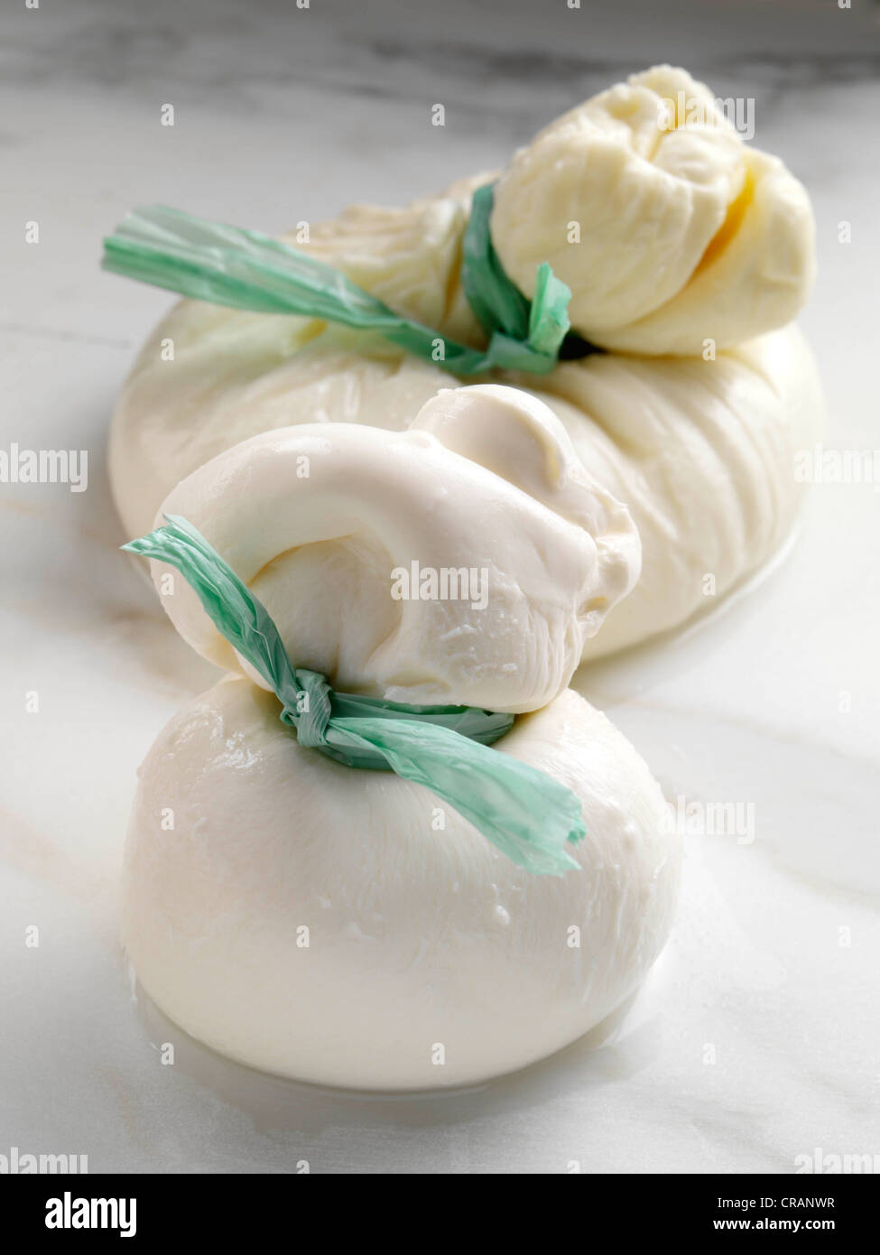 A whole Burrata Italian soft cheese Stock Photo - Alamy